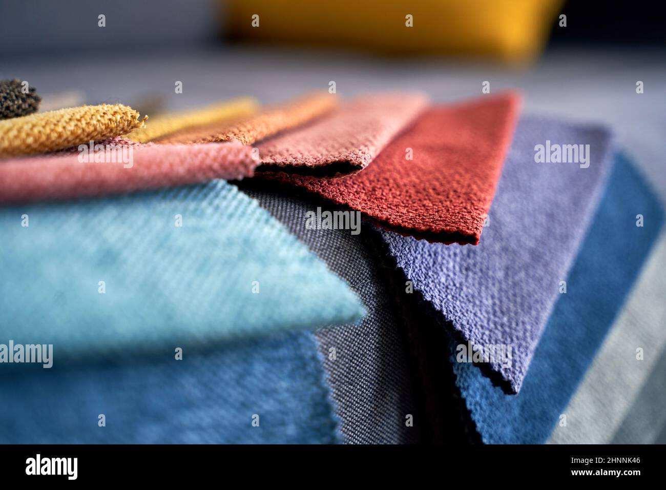 Colorful upholstery fabric samples on the home sofa Stock Photo - Alamy