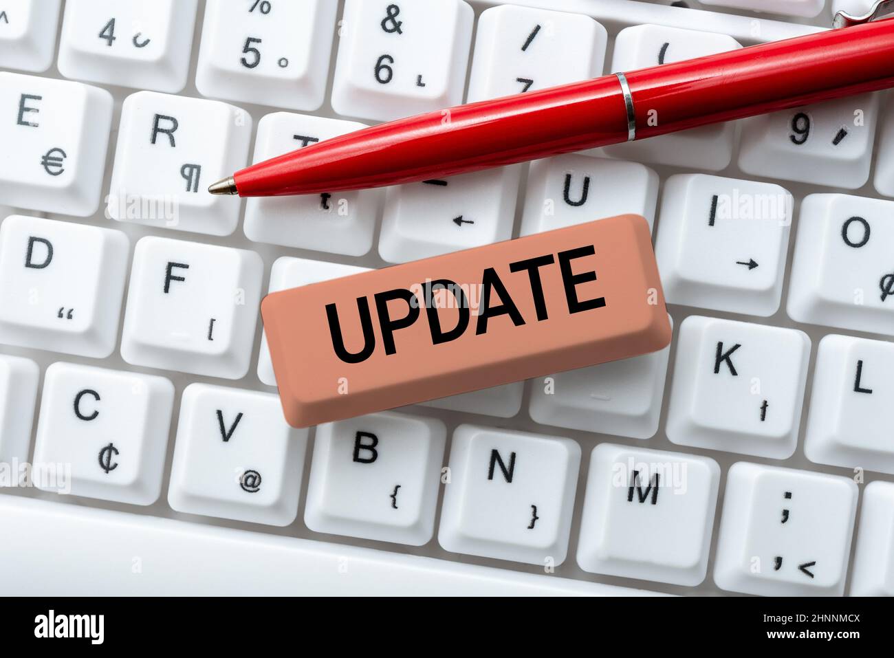 Hand writing sign UPDATE, Business approach make something more modern ...