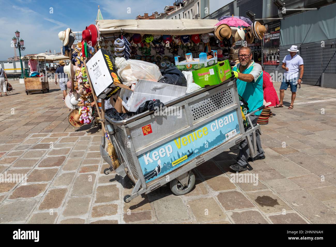 garbage men collect the garbage from the houses and transport it to a ...