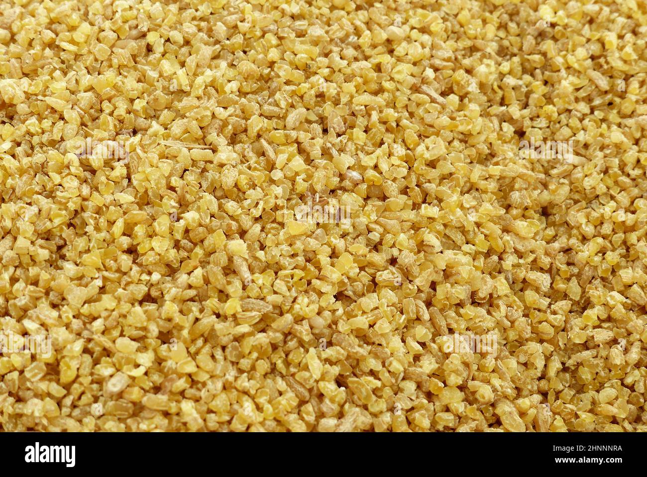 Organic bulgur made from wheat for pilaf in a bowl, close-up bulgur ...