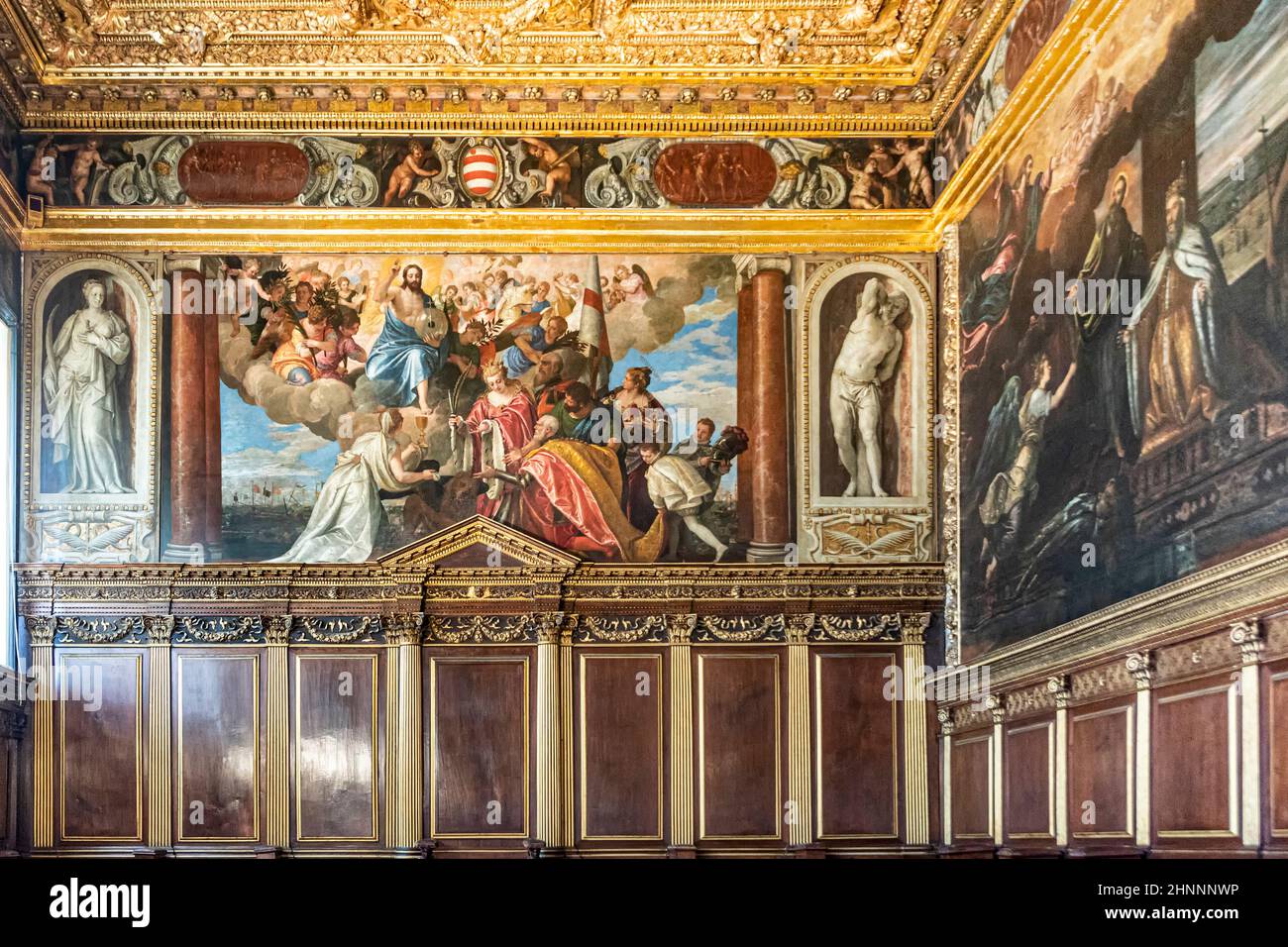 chamber of the great council at the Doge Palace with tourist. Ceiling ...