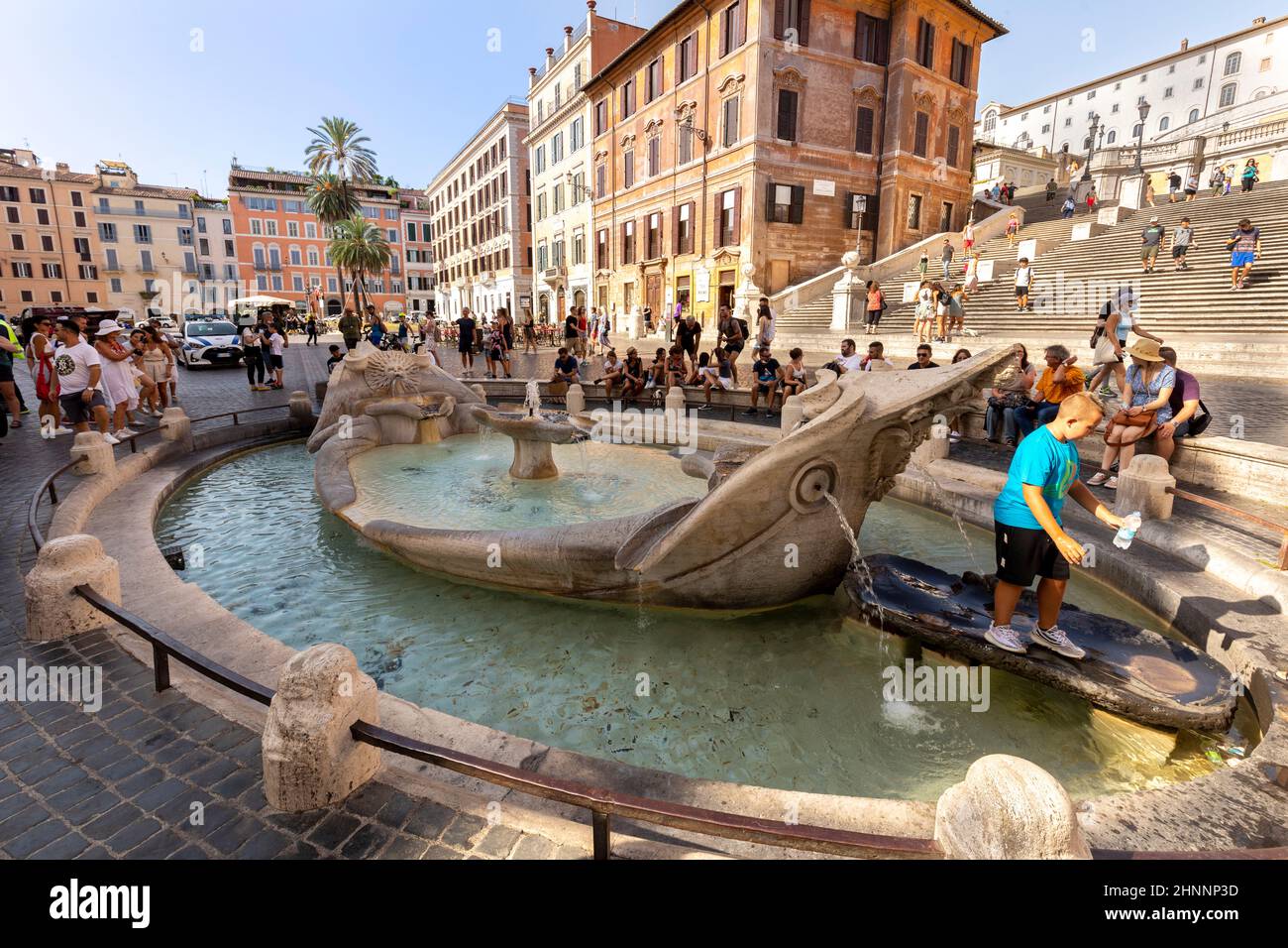 people enjoy Spanish stairs on Piazza di Spagna in Rome. Spanish stairs ...