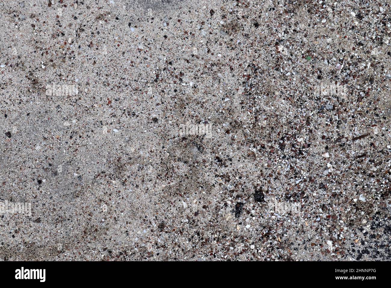 Detailed close up view on a brown sand ground texture in high ...