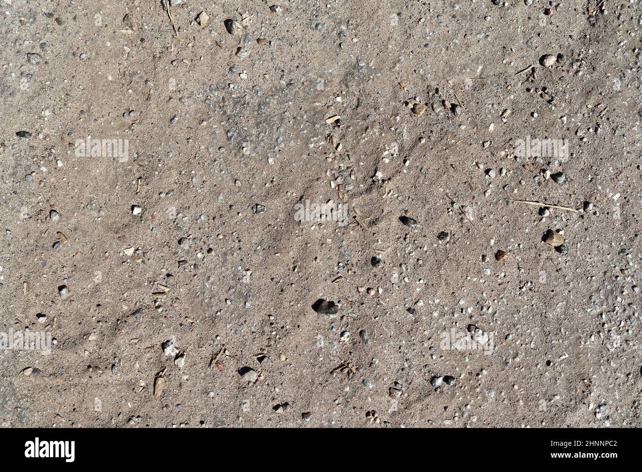 Detailed close up view on a brown sand ground texture in high ...