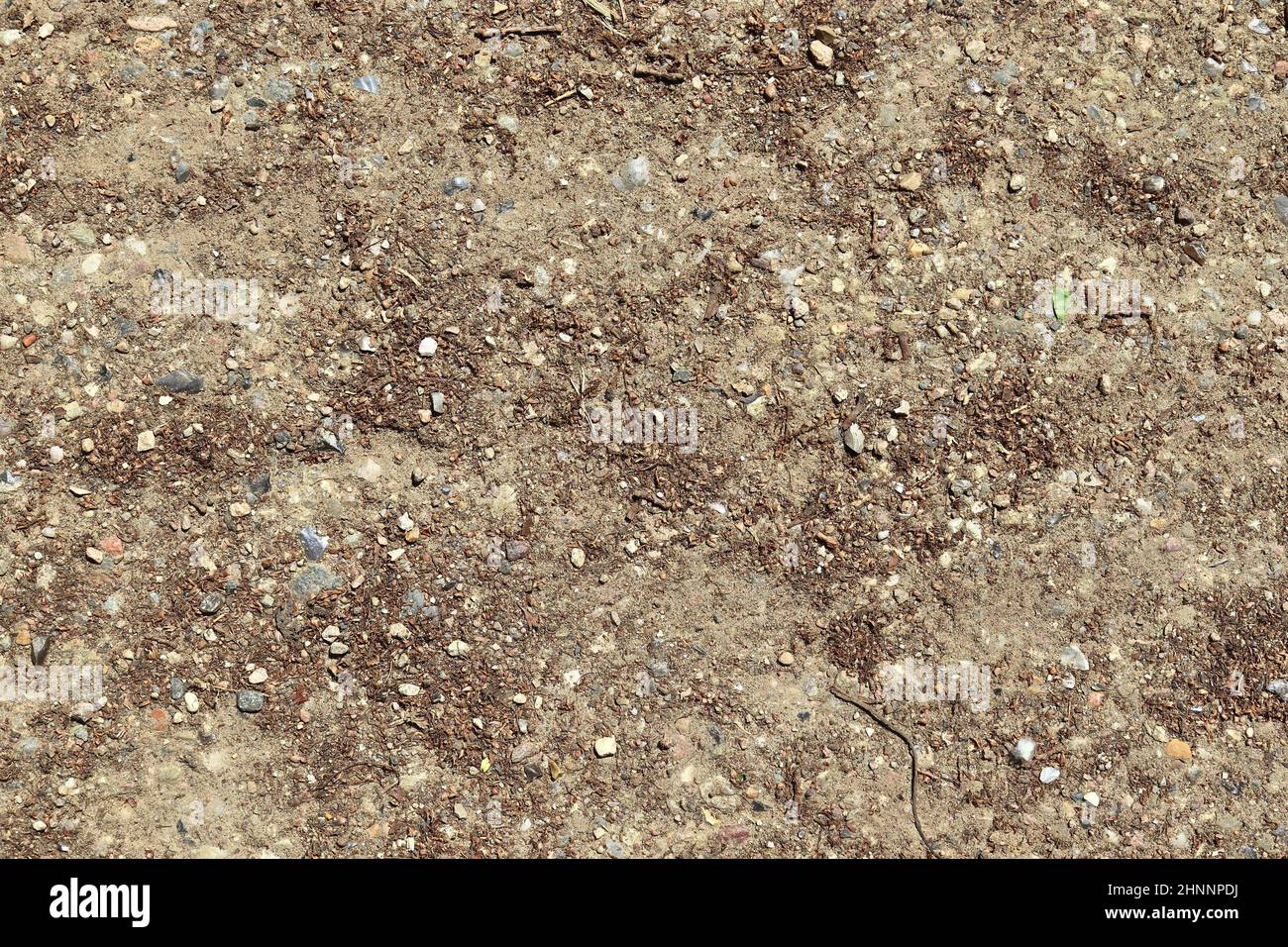 Detailed close up view on a brown sand ground texture in high ...