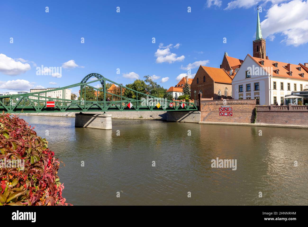 View of the Tumski Bridge and the tower of Collegiate Church of the ...