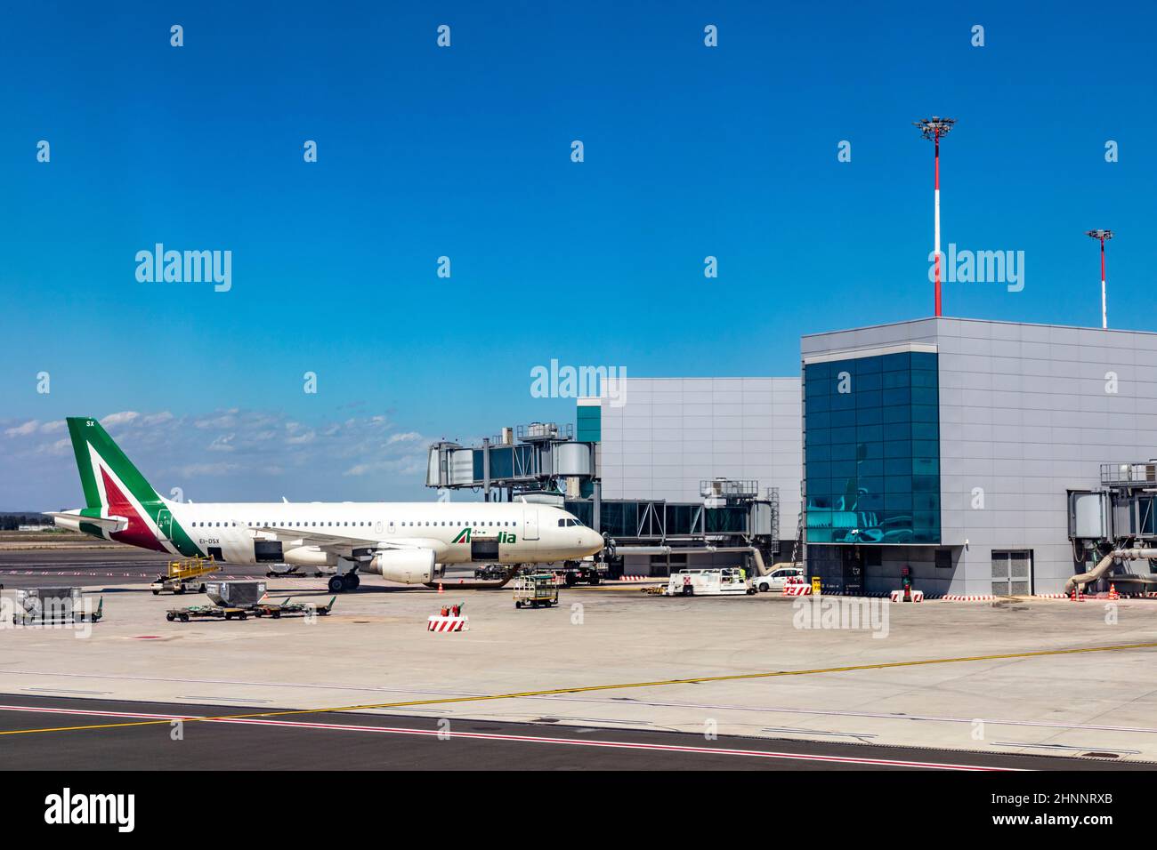 view to roman airport Fiumicino in Rome with aircraft at gate. It is ...