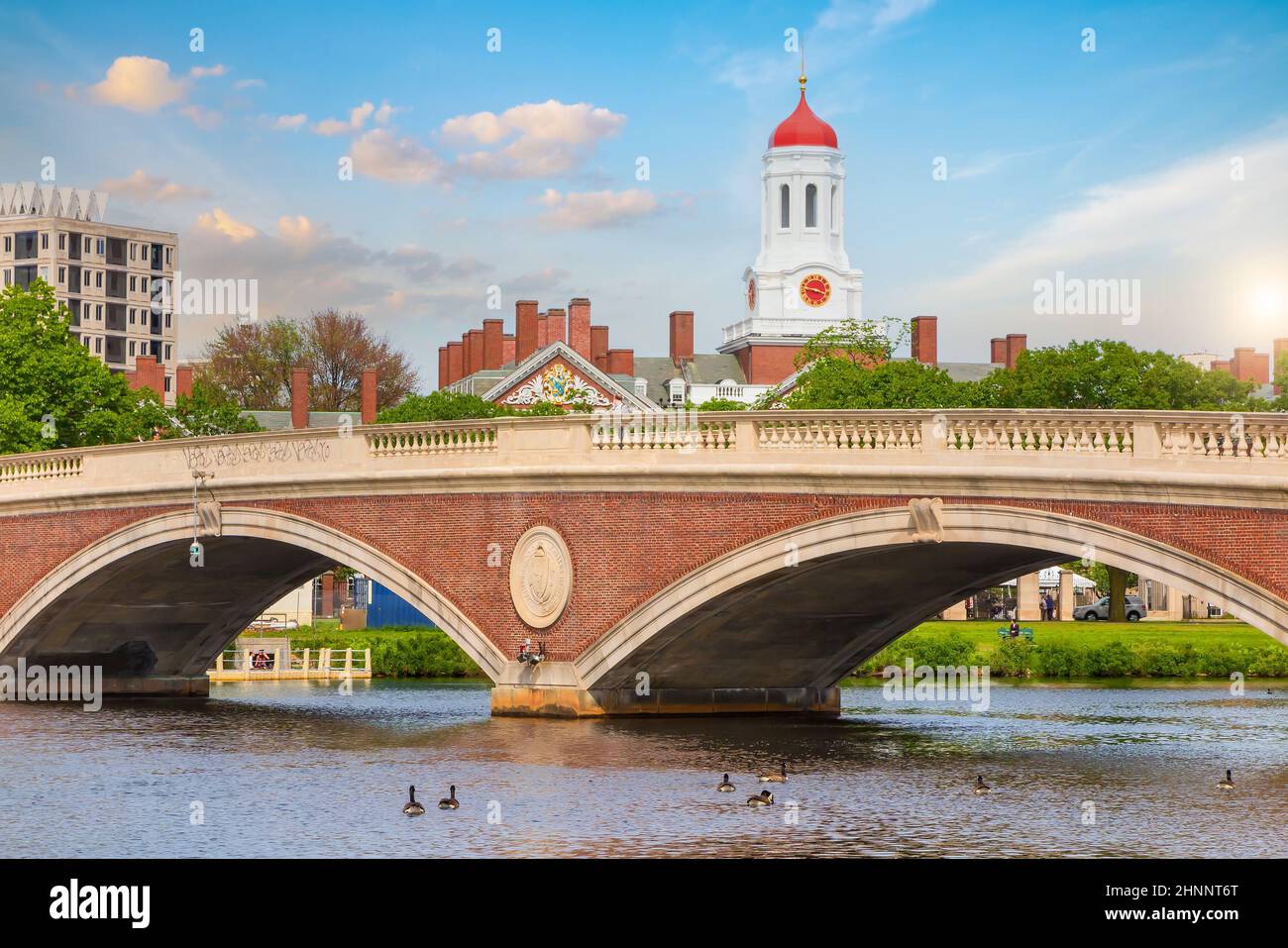 Vintage Bridge with clock tower over Charles River Boston Stock Photo ...