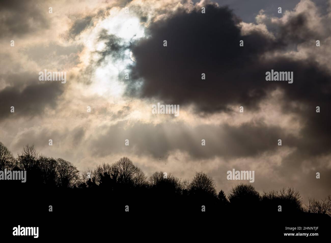a foreboding dramatic dark grey thunder storm cloud gathers as the ...