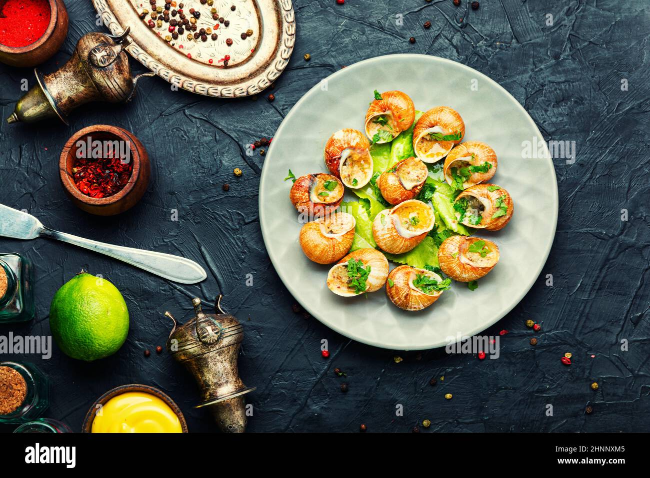 Bourgogne snail or escargot stuffed with green butter, French food ...