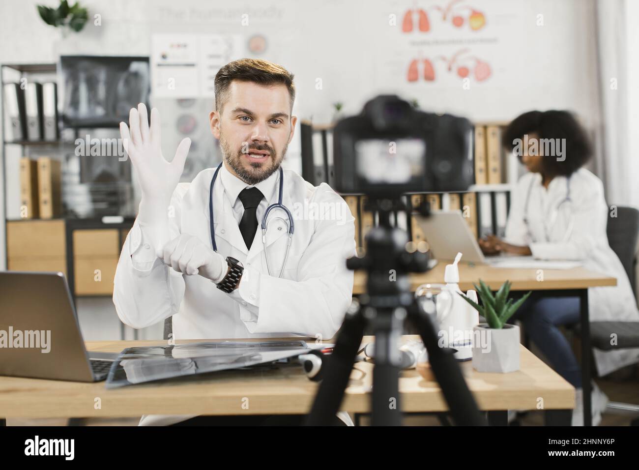 Doctor in blur background putting hi-res stock photography and images ...