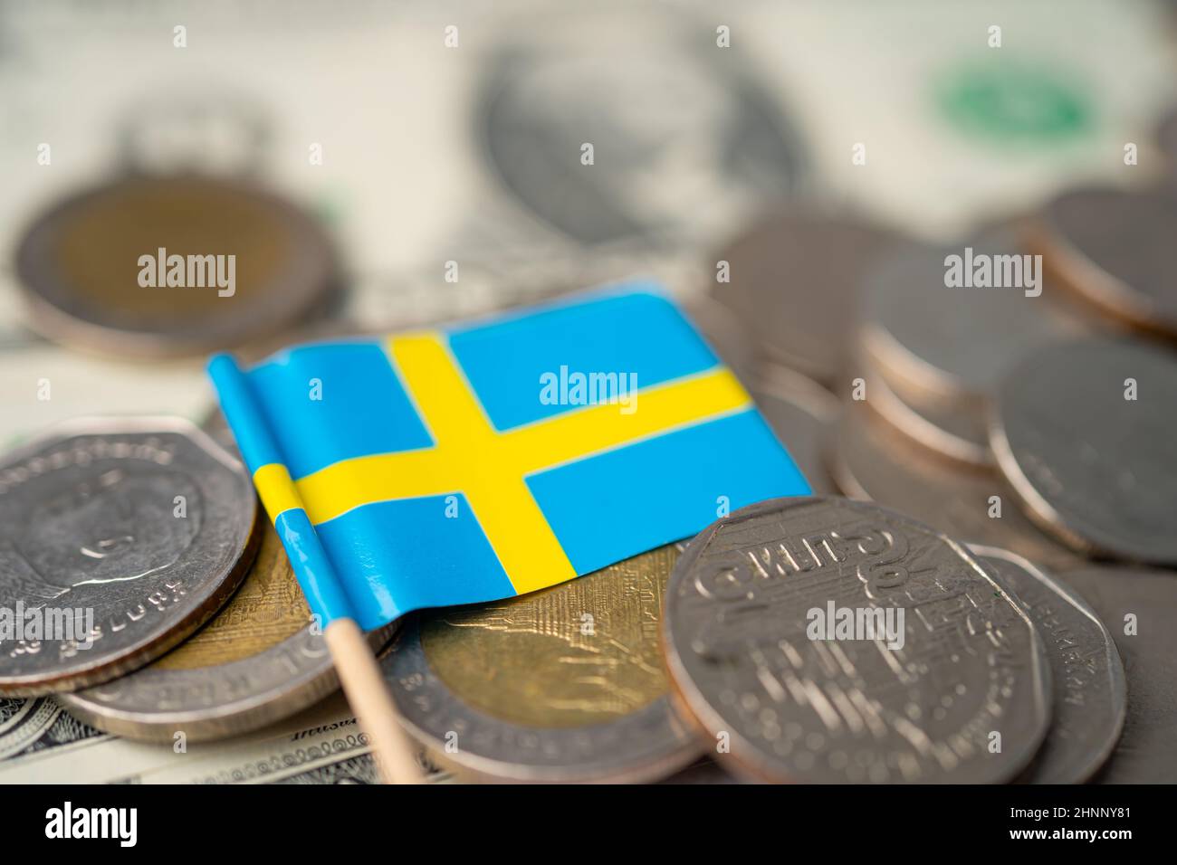 Stack of coins with Sweden flag on white background Stock Photo - Alamy