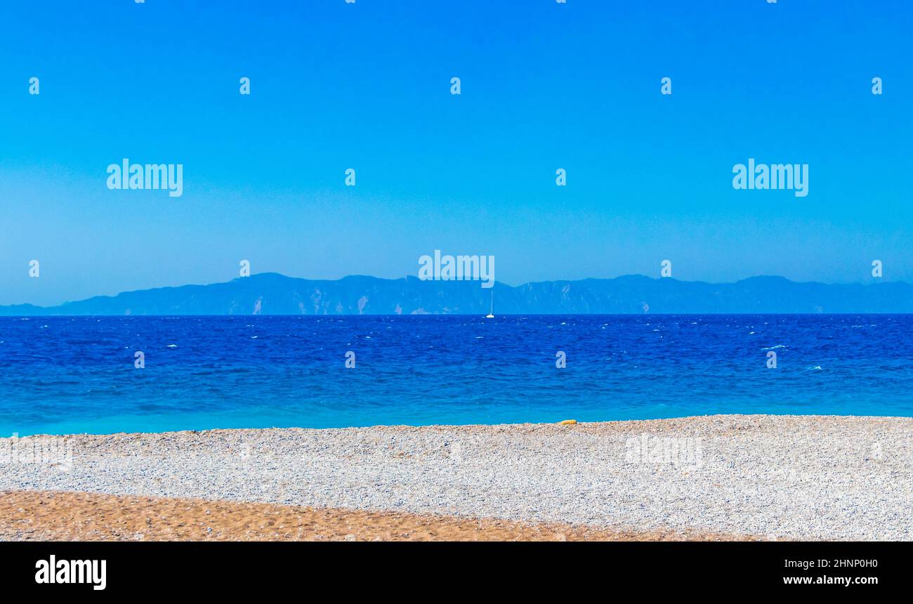 Elli beach coast landscape with turquoise clear water and view to ...