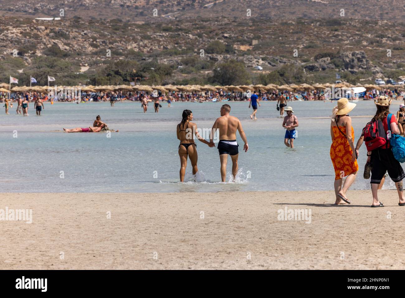 People relaxing on the famous pink coral beach of Elafonisi on Crete ...