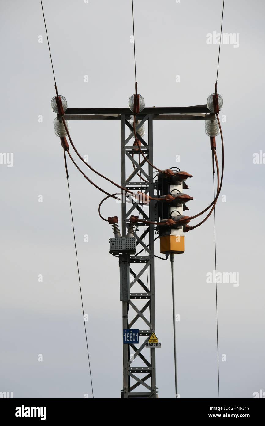 High voltage pylon with overhead lines in Spain Stock Photo - Alamy