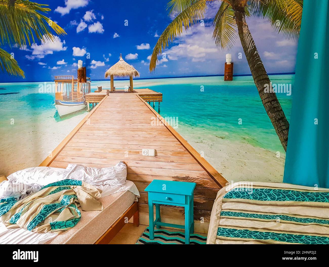 Blue hotel room with palm tree paradise wallpaper in Mallorca Stock ...