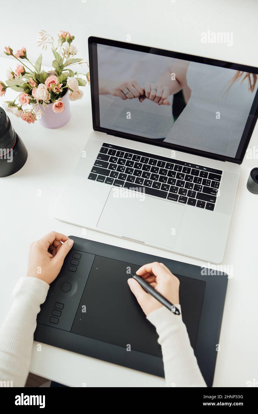 Female editor using stylus hi-res stock photography and images - Alamy