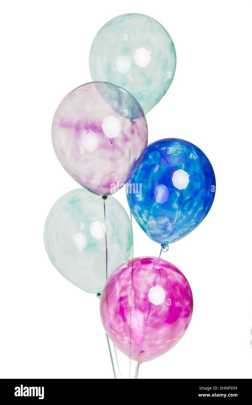 several colored balloons isolated on white background Stock Photo - Alamy