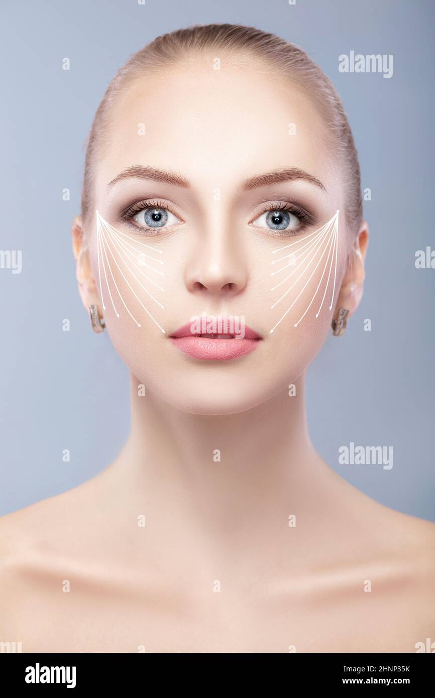Spa portrait of attractive woman with arrows on her face Face lifting ...