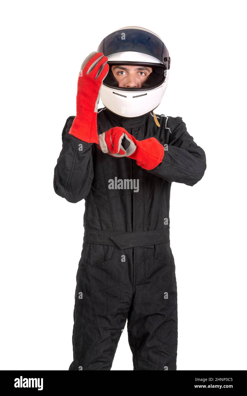 Racing driver putting on his gloves with helmet isolated in white Stock ...