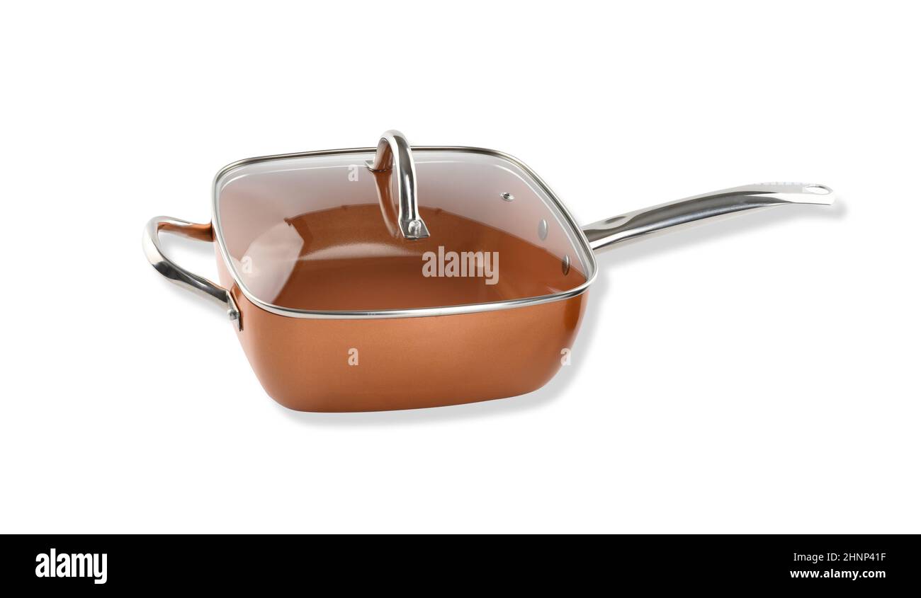 copper deep frying pan with transparent lid on white background Stock ...