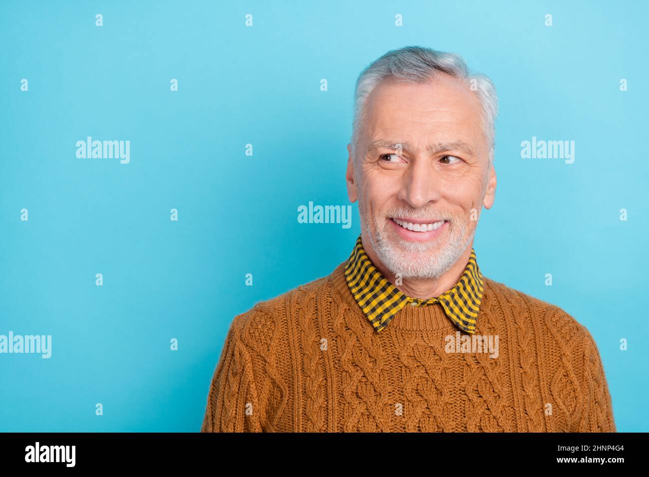 Photo of attractive dreamy retired man wear brown sweater looking empty ...