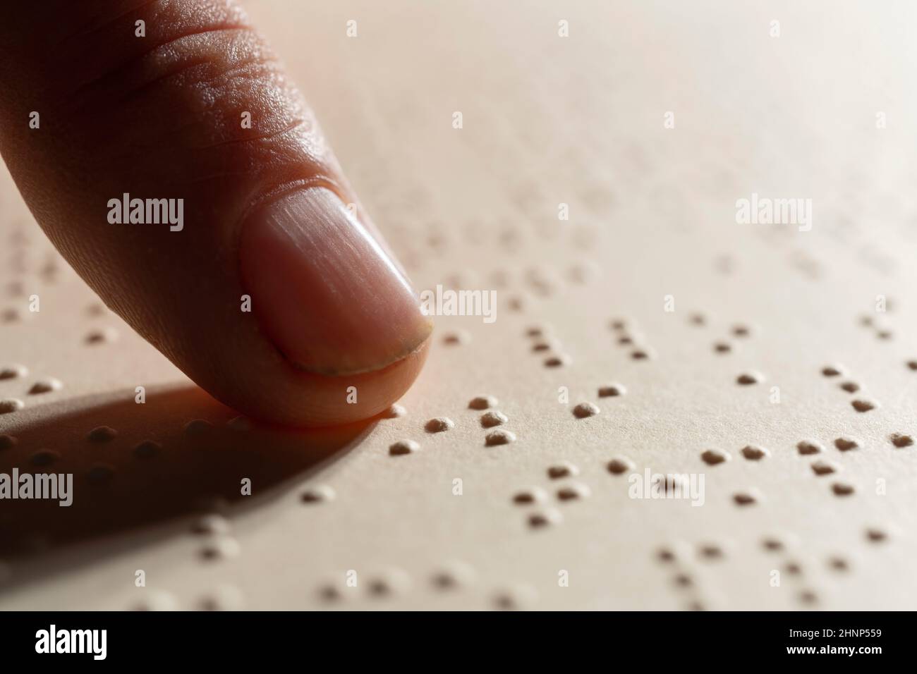 Braille alphabet book page Stock Photo - Alamy