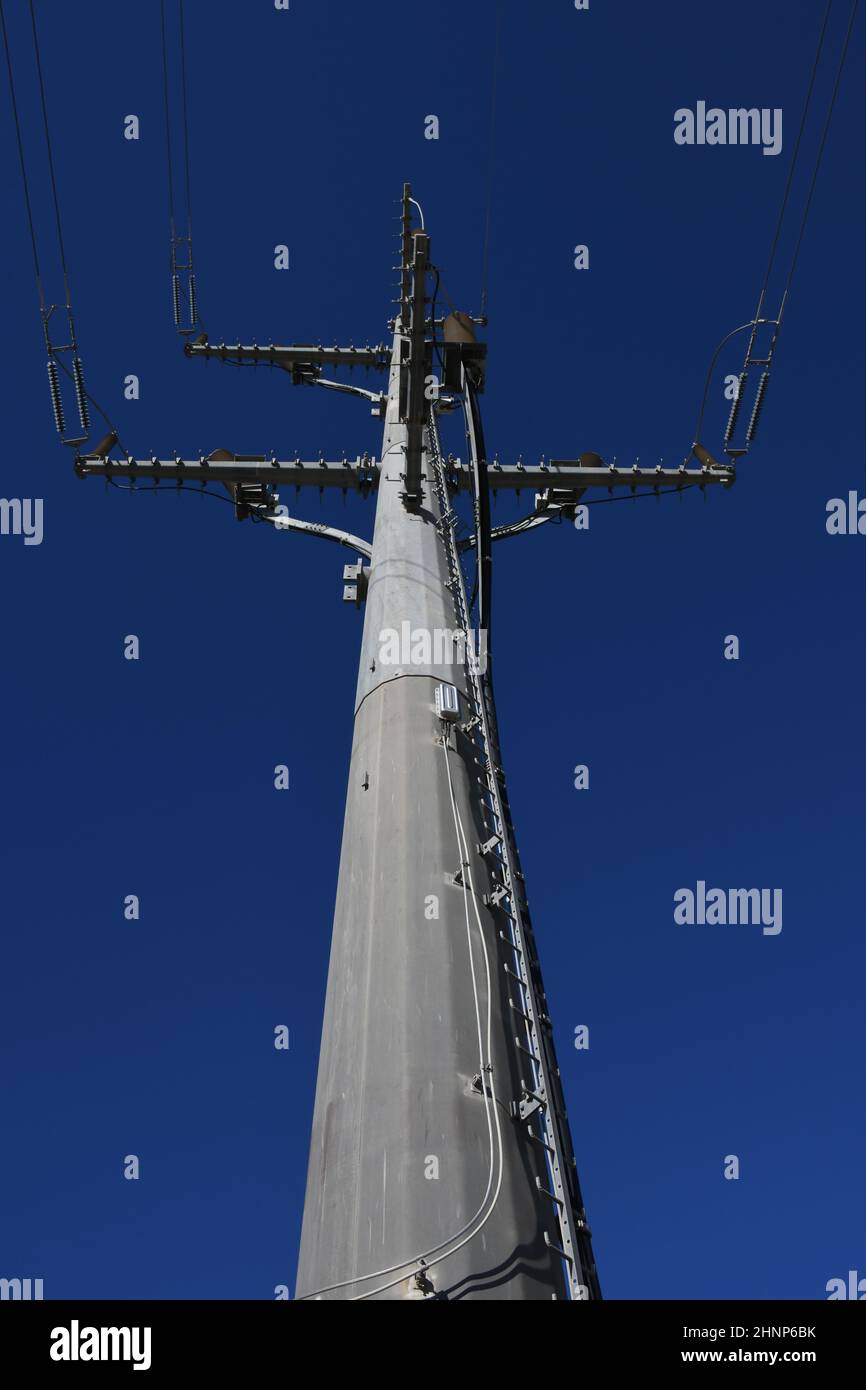 High voltage pylon with overhead lines in Spain Stock Photo - Alamy