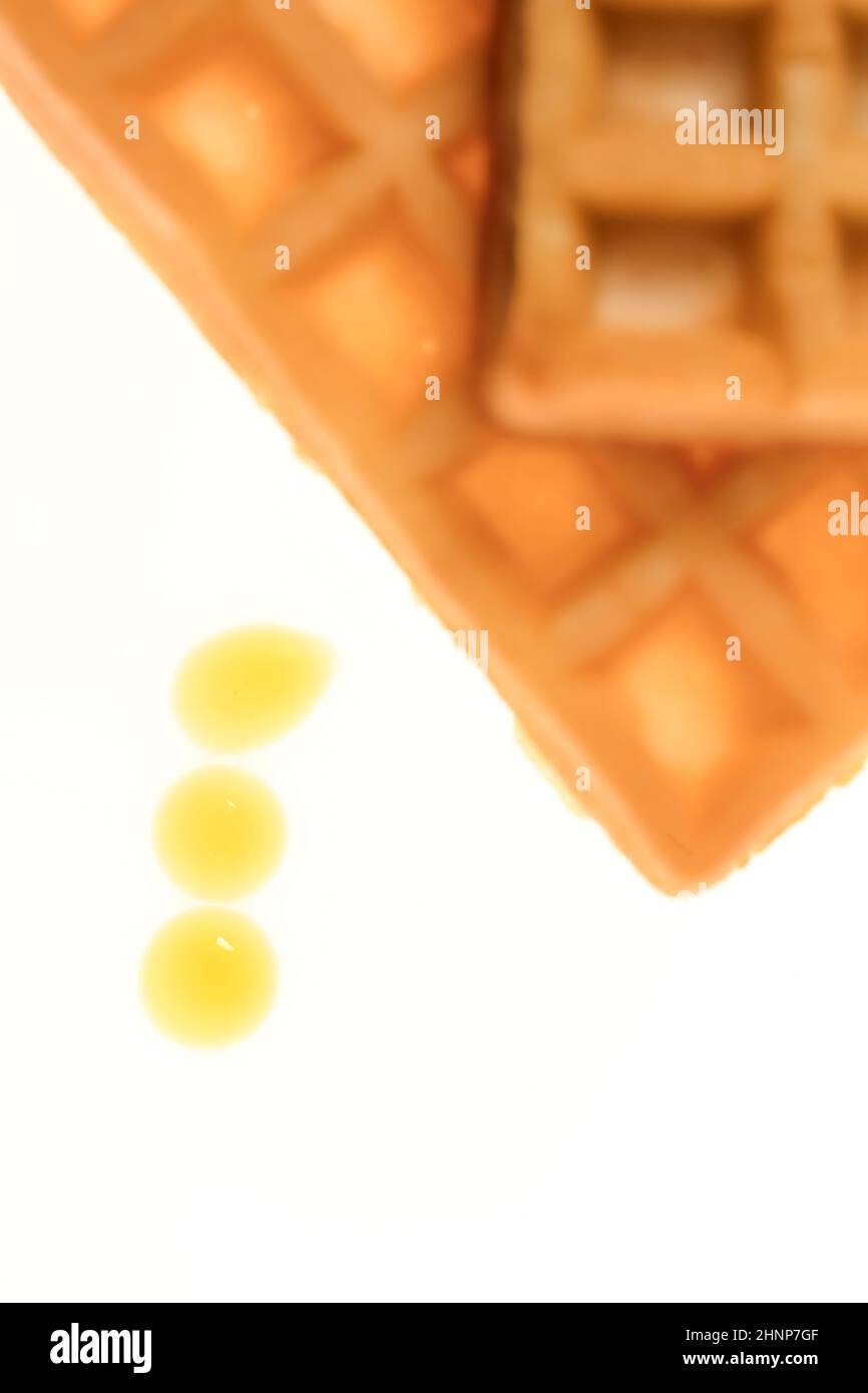 Waffle and maple syrup, close up food representation Stock Photo - Alamy
