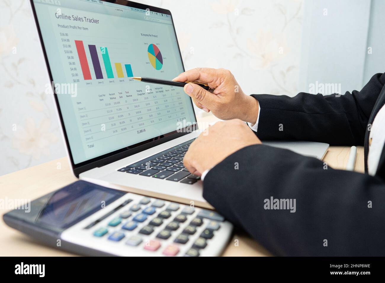 Asian accountant type keyboard to enter information, working, calculate ...