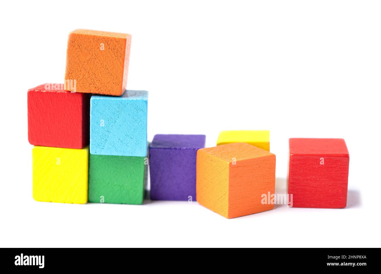 Wooden colorful building cube toy block on white background Stock Photo ...