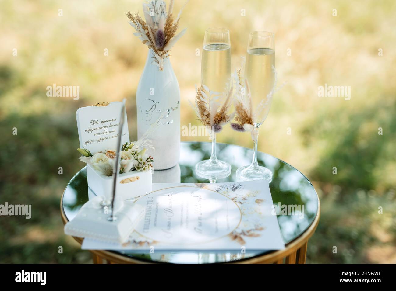 wedding rings with a decor Stock Photo - Alamy