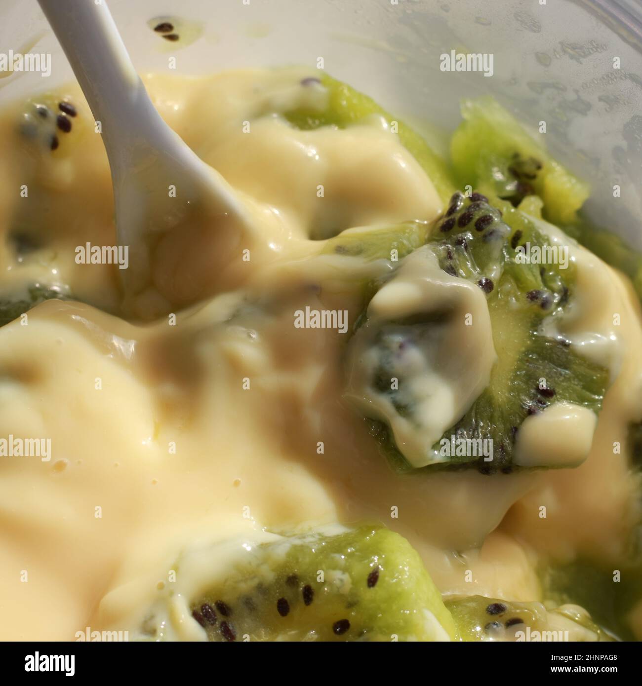 Food and Drink Concept - Close-up of Sliced Kiwi Fruit and Creamy Custard Dessert Stock Photo ...