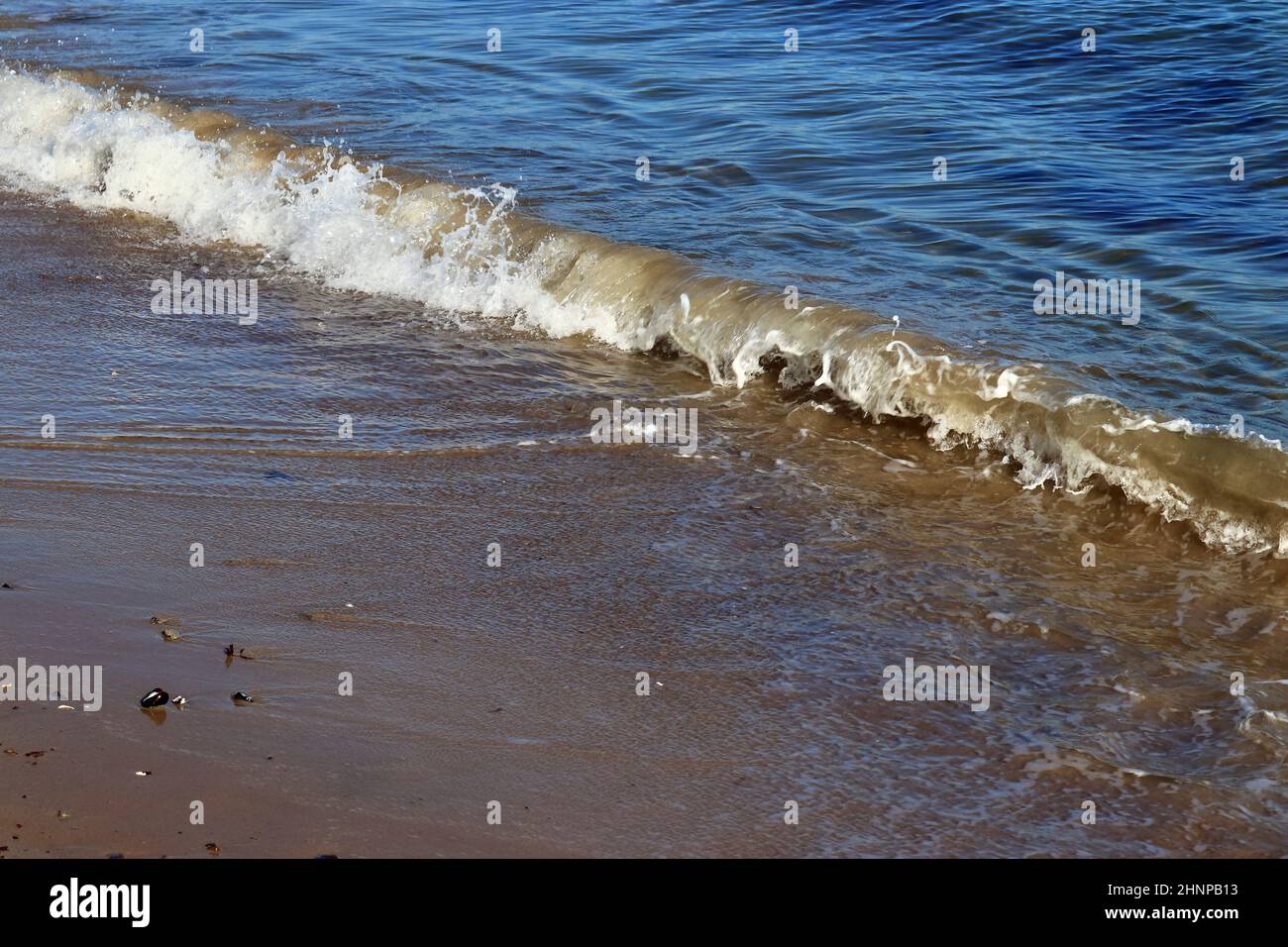Detailed close up view on water surfaces with waves and ripples and the ...