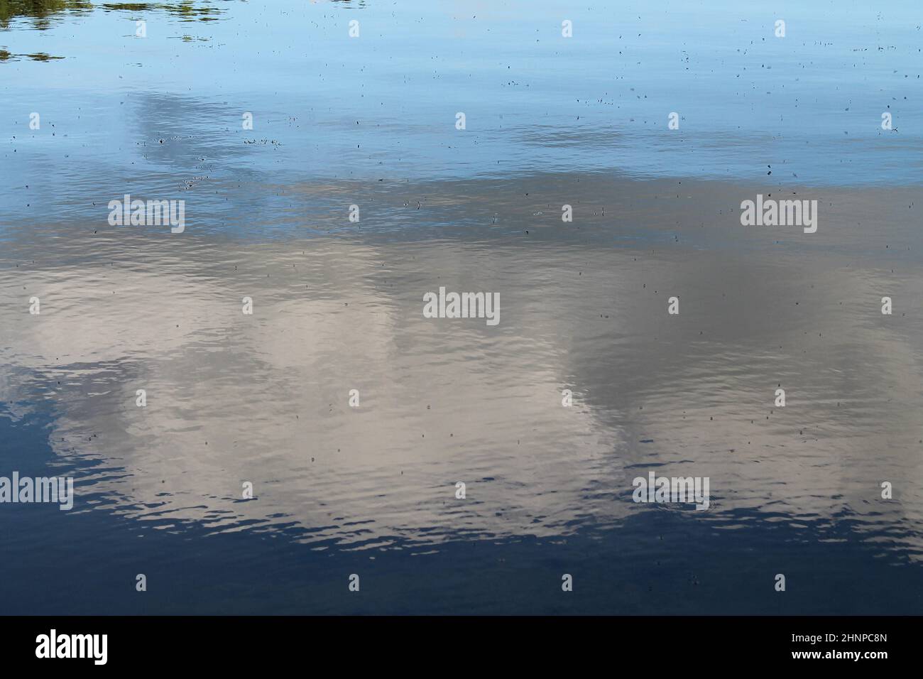 Detailed close up view on water surfaces with waves and ripples and the ...