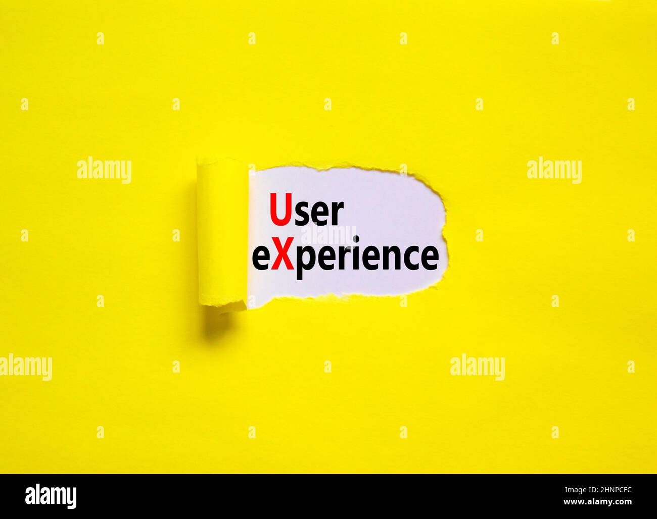 UX user experience symbol. Concept words UX user experience on yellow ...