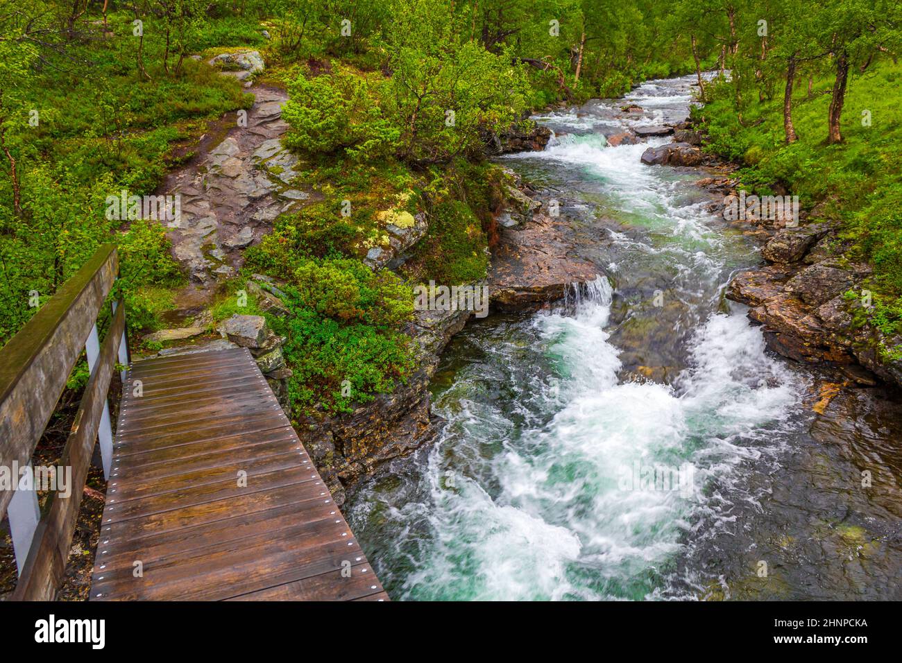 Beautiful turquoise river bridge and waterfall Vettisfossen in ...