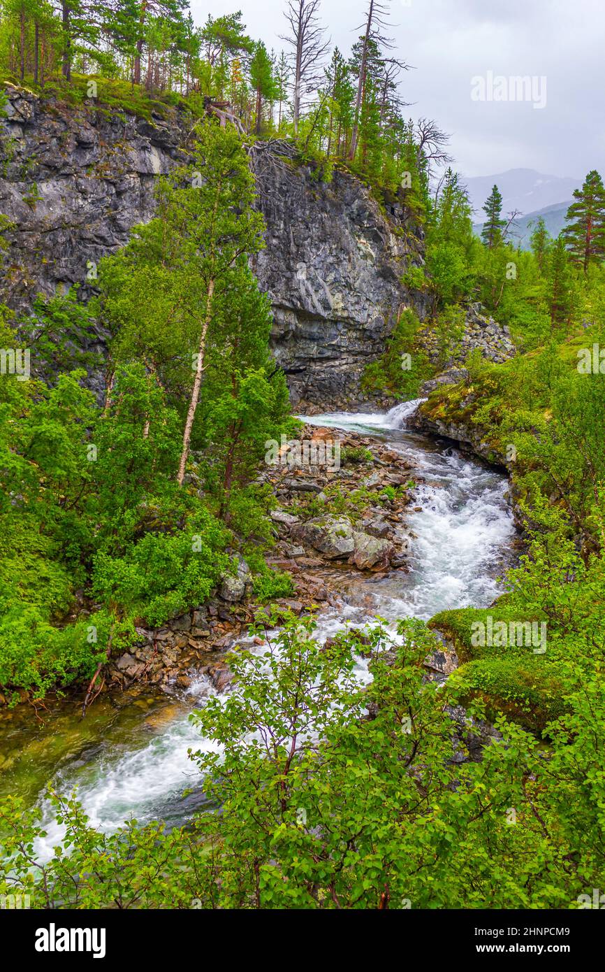 Beautiful turquoise river and waterfall Vettisfossen in Utladalen Øvre ...