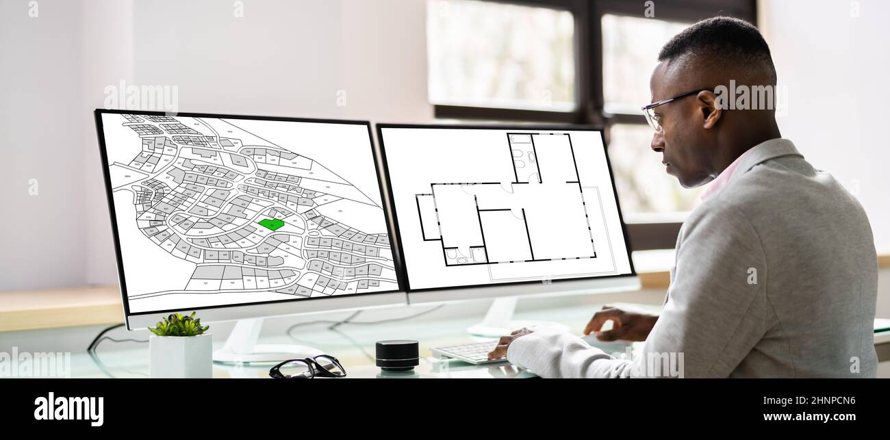 Cartographer looking at map hi-res stock photography and images - Alamy