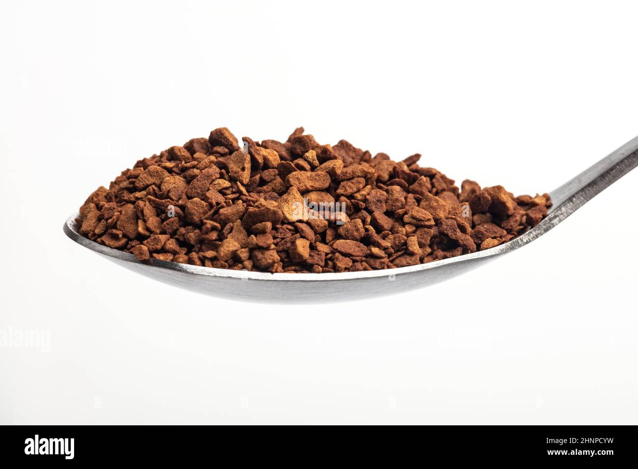 Instant Coffee on a Teaspoon over whitebackground Stock Photo - Alamy
