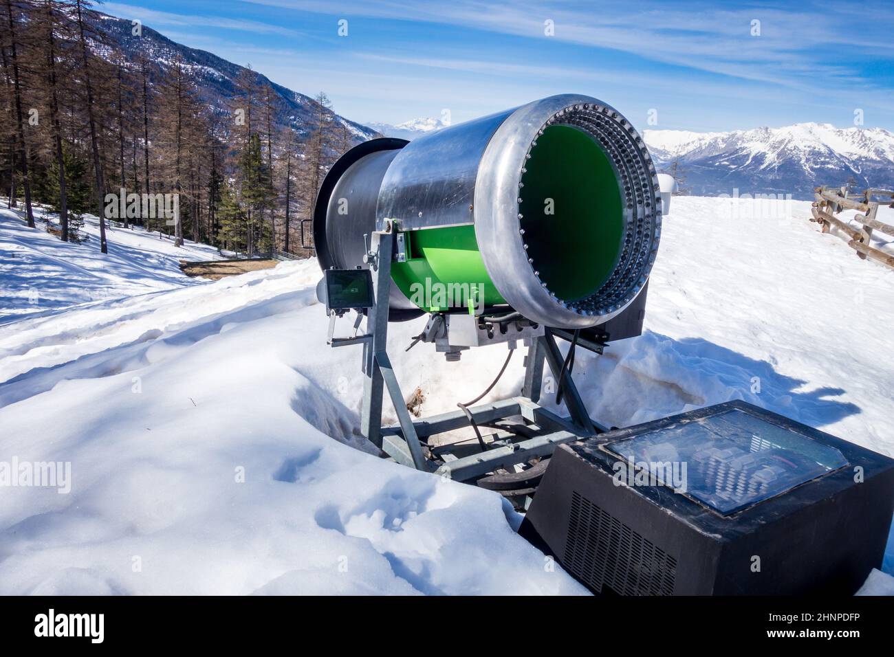 Snow gun in a winter ski resort Stock Photo - Alamy