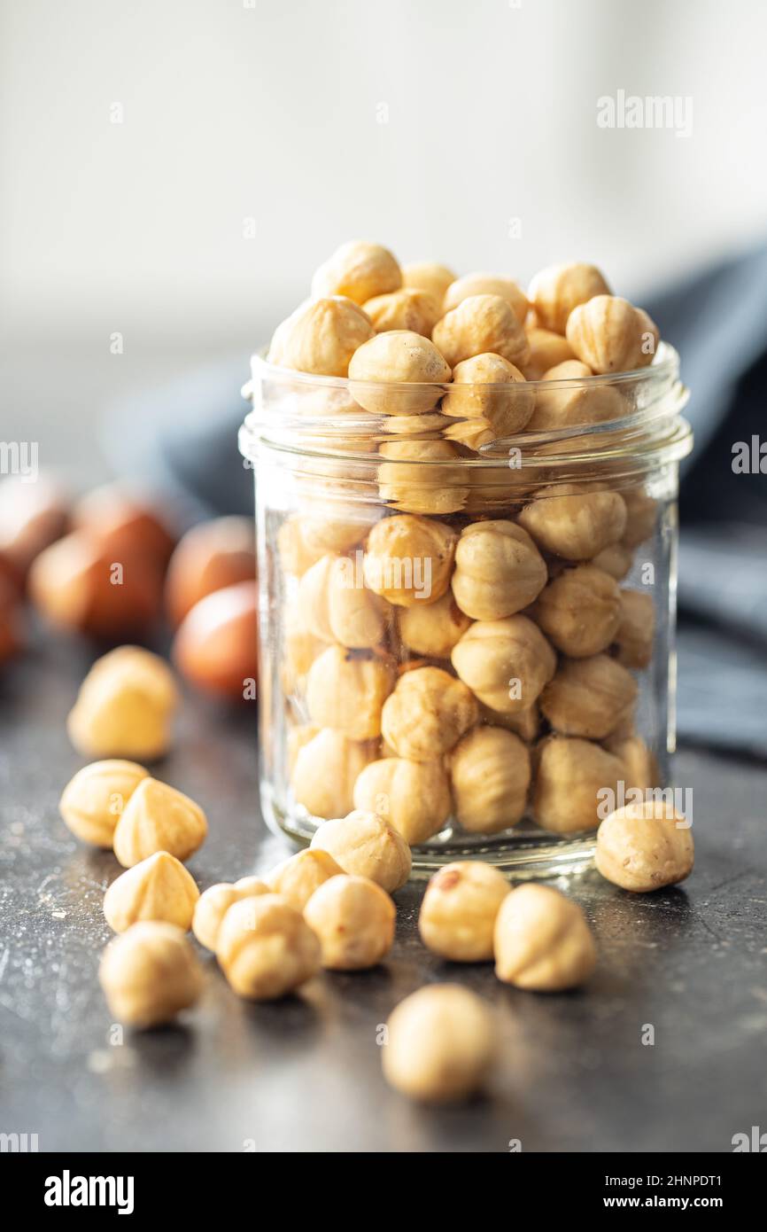 Peeled roasted hazelnut kernels in jar Stock Photo - Alamy
