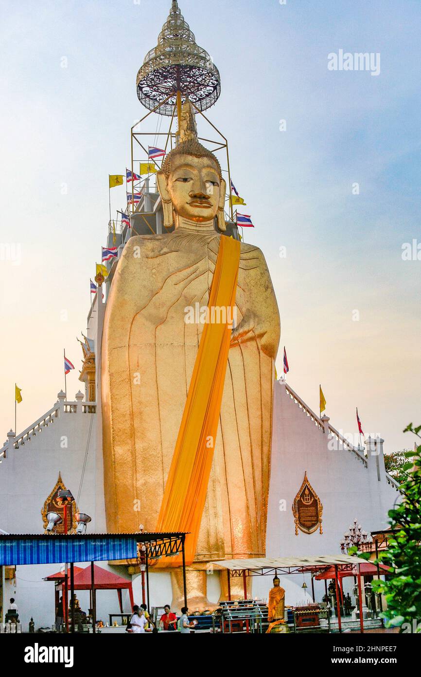 Huge Buddha statue at Wat Intharawihan in Bangkok, Thailand. The temple ...
