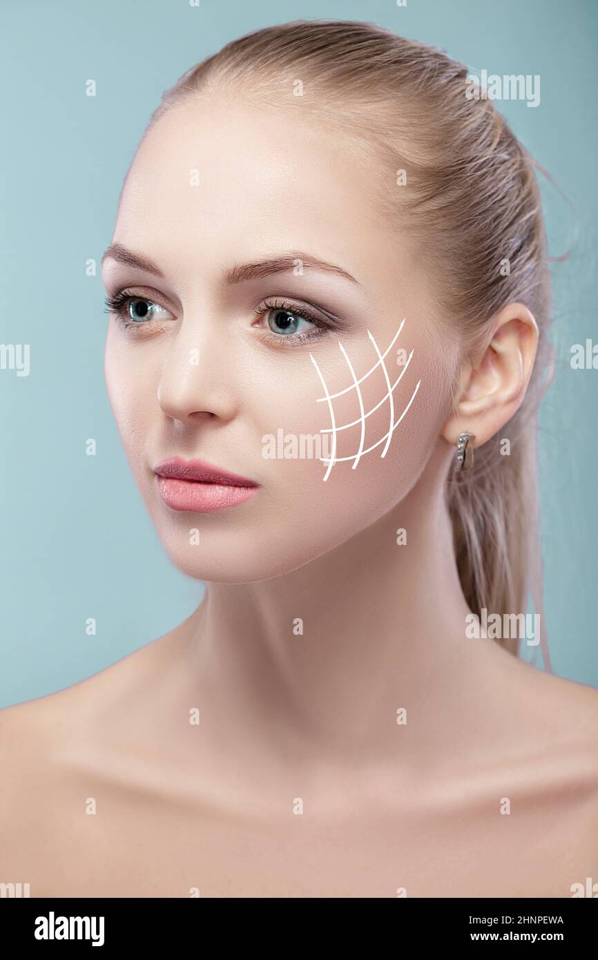 Spa portrait of attractive woman with arrows on her face Face lifting ...