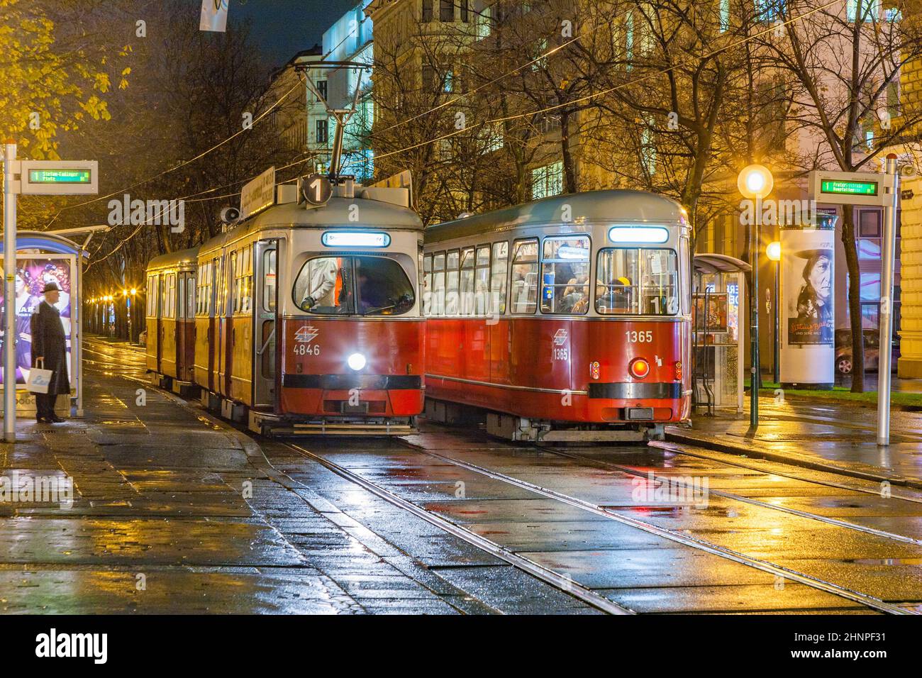 Vienna - famous street car by night with reflection at the street Stock ...