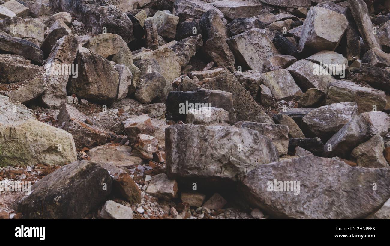 Pile of stones background. heap of rocks. ruins of destroyed buildings ...