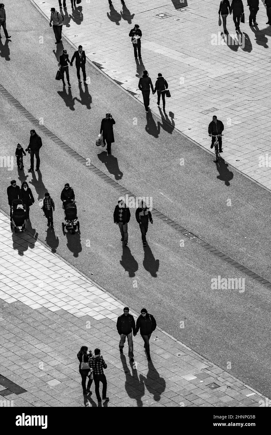 Crowd of people walking aerial view Black and White Stock Photos ...
