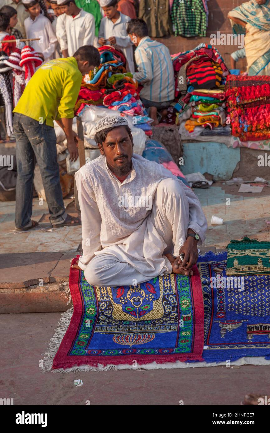 muslim man sells carpets for praying at the central market Meena Bazaar ...
