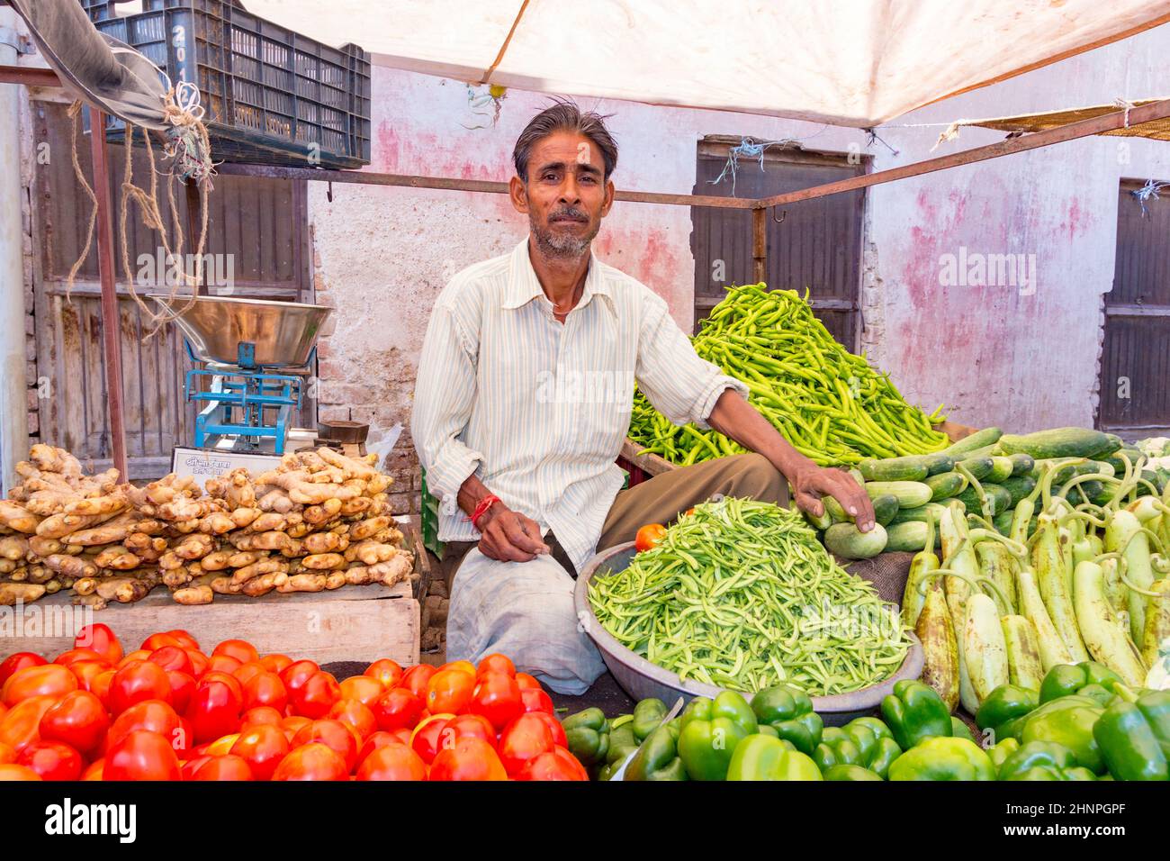 people sell their fresh fruits and vegetables at the outdoor market in ...
