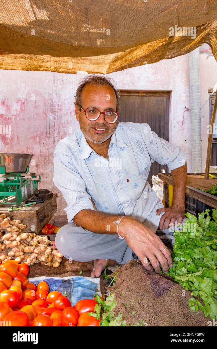 people sell their fresh fruits and vegetables at the outdoor market in ...